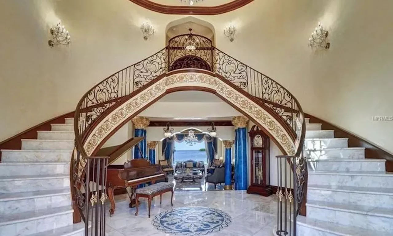 This $18 million Florida mega-mansion comes with its own private ...