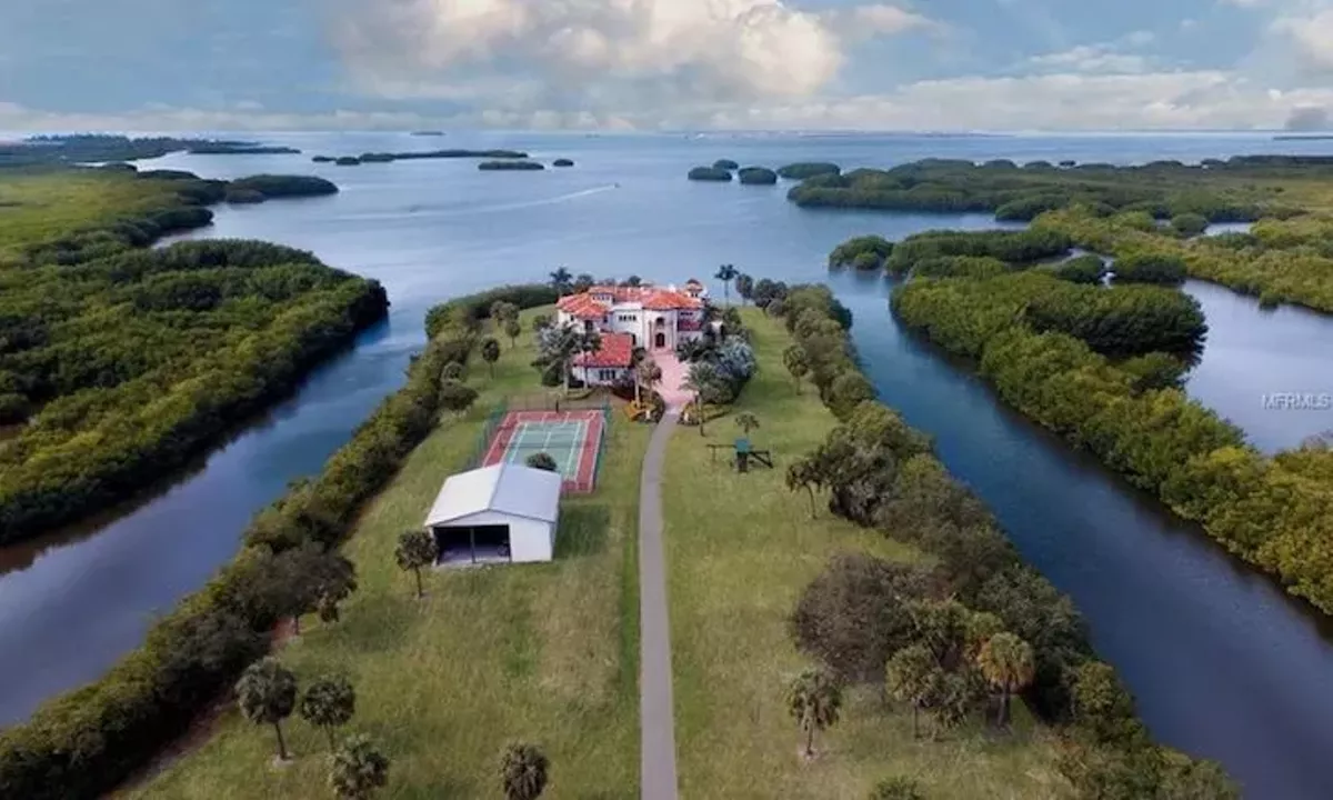 This $18 million Florida mega-mansion comes with its own private ...