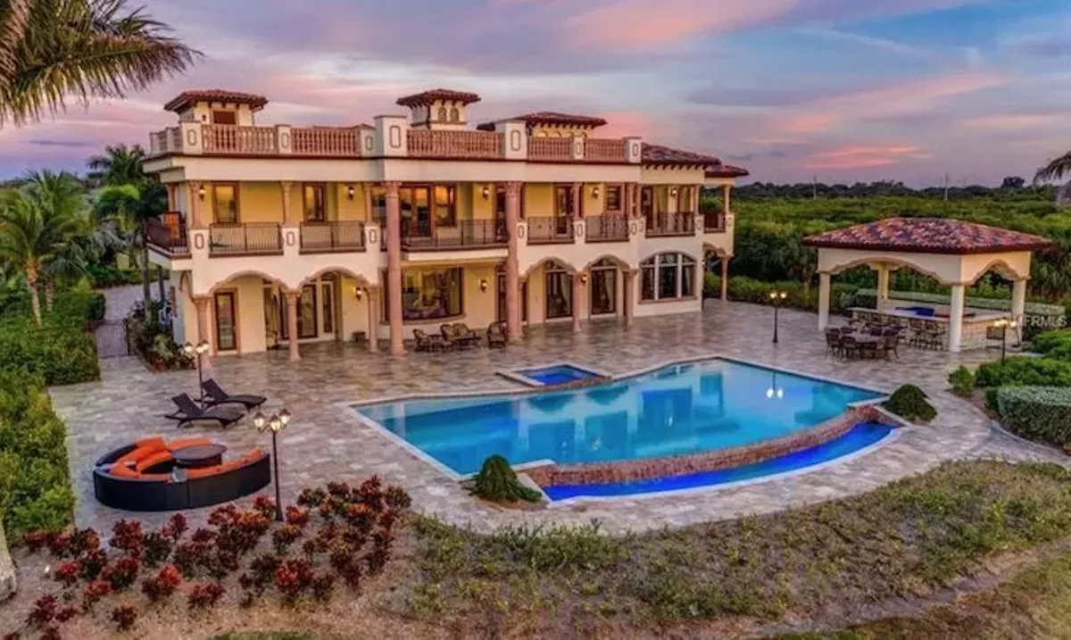 This $18 million Florida mega-mansion comes with its own private ...