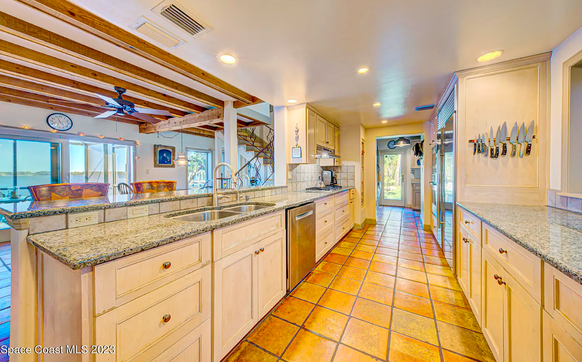 This waterfront hideaway home is for sale just outside Orlando, and it ...