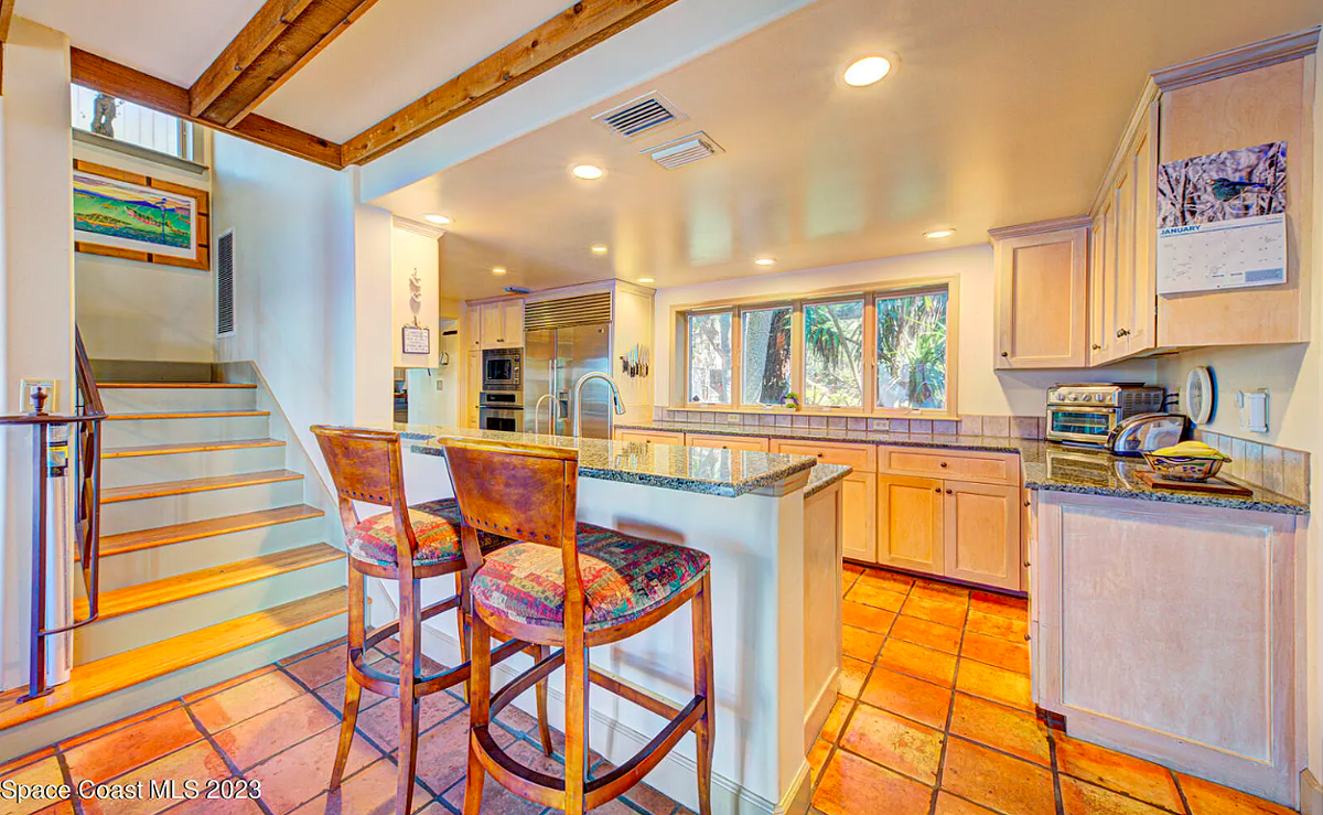 This waterfront hideaway home is for sale just outside Orlando, and it ...